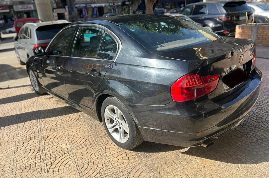 318 BMW 2010 Cairo Black 6999006 - Car for sale : Hatla2ee