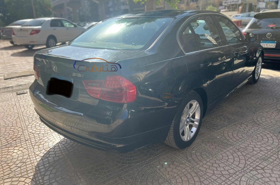 318 BMW 2010 Cairo Black 6999006 - Car for sale : Hatla2ee