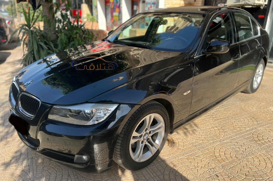 318 BMW 2010 Cairo Black 6999006 - Car for sale : Hatla2ee
