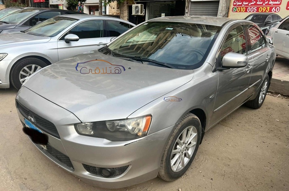 Lancer Mitsubishi 2016 Cairo Silver 6999036 - Car for sale : Hatla2ee