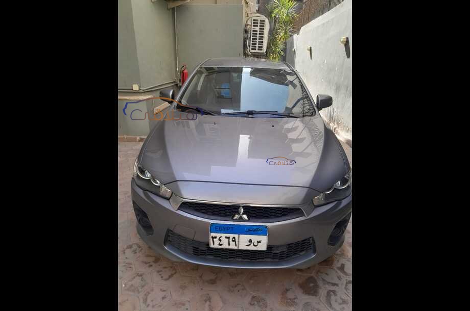 Lancer Puma Mitsubishi 2018 Giza Silver 7000202 - Car for sale : Hatla2ee