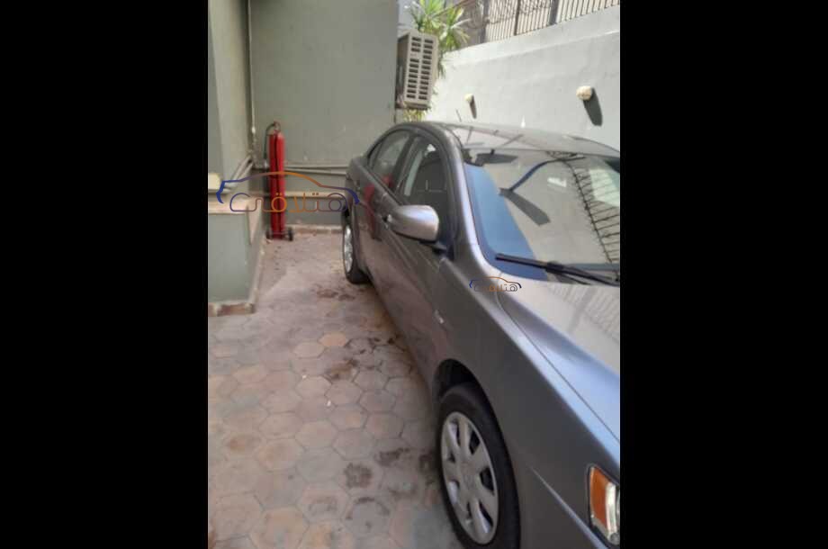 Lancer Puma Mitsubishi 2018 Giza Silver 7000202 - Car for sale : Hatla2ee