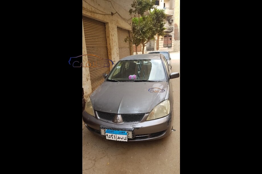 Lancer Puma Mitsubishi 2009 Asyut Silver 7000805 - Car for sale : Hatla2ee