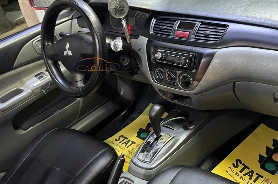 Lancer Puma Mitsubishi 2013 Tanta Red 7002421 - Car for sale : Hatla2ee