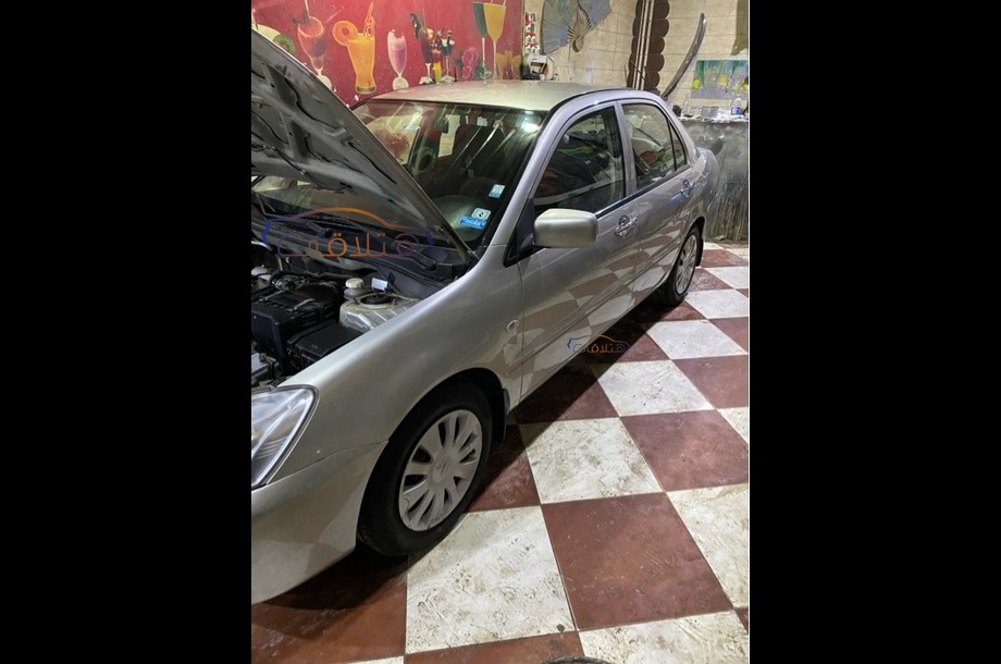 Lancer Puma Mitsubishi 2014 Mansoura Gold 7004470 - Car for sale : Hatla2ee