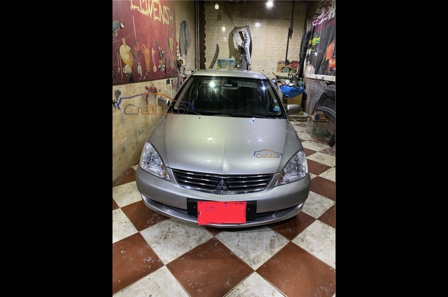 Lancer Puma Mitsubishi 2014 Mansoura Gold 7004470 - Car for sale : Hatla2ee