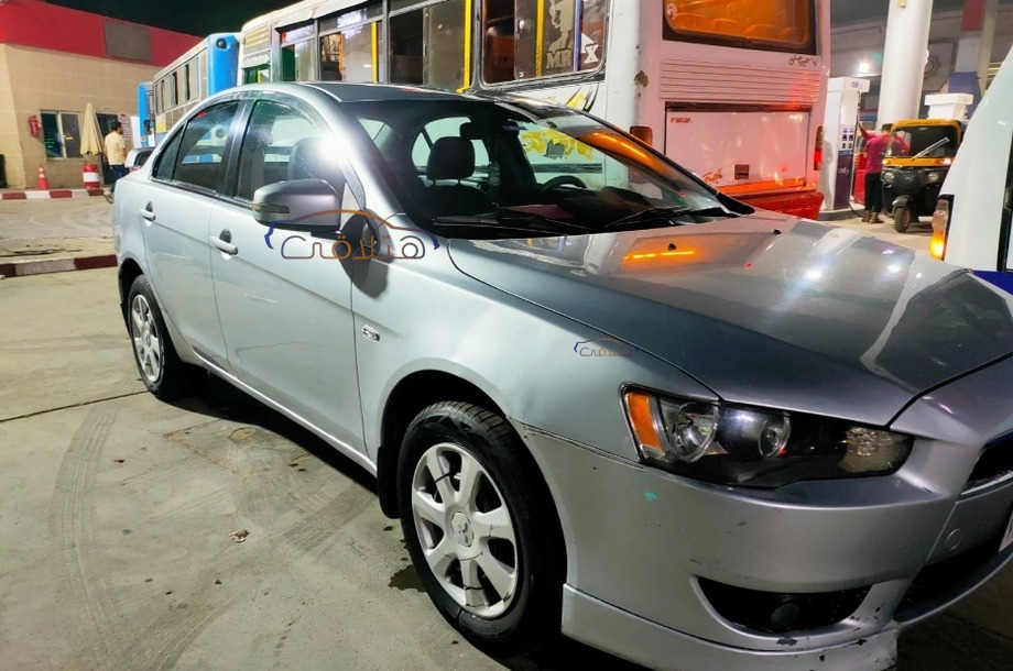 Lancer Mitsubishi 2015 Cairo Silver 7006718 - Car for sale : Hatla2ee