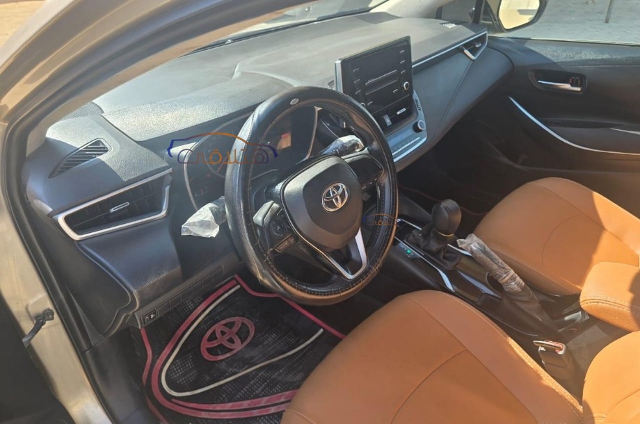 Corolla Toyota 2020 Faiyum Beige 7008852 - Car for sale : Hatla2ee
