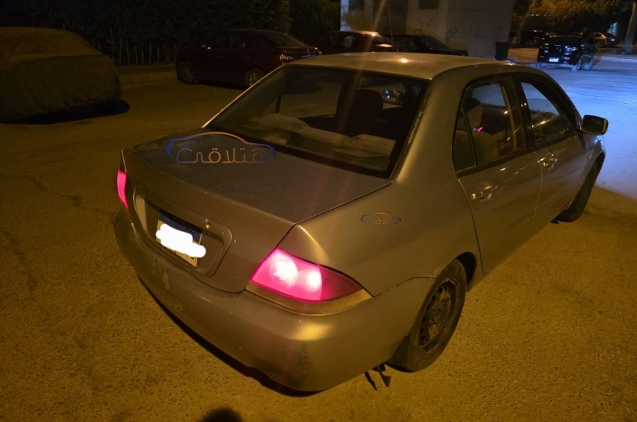 Lancer Puma Mitsubishi 2006 Hadayek October Silver 7009543 - Car for ...