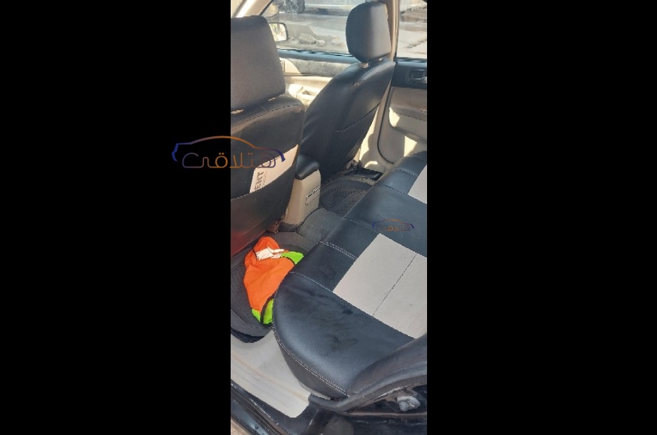 Lancer Mitsubishi 2009 Maadi Black 7012136 - Car for sale : Hatla2ee