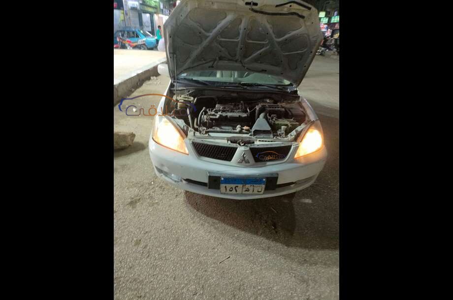 Lancer Puma Mitsubishi 2011 Maadi White 7013139 - Car for sale : Hatla2ee