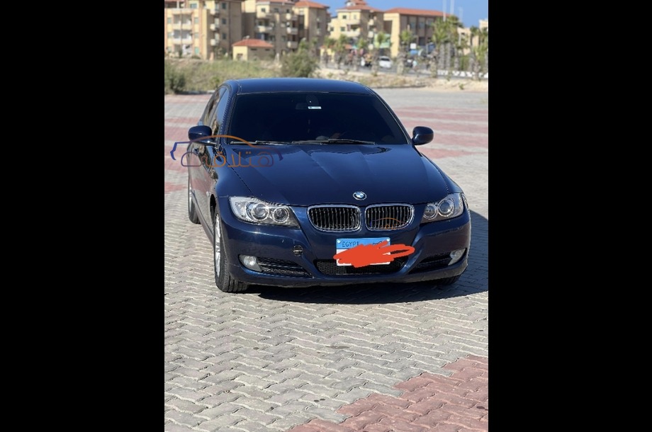 316 BMW 2010 Gamasa Red 7013987 - Car for sale : Hatla2ee