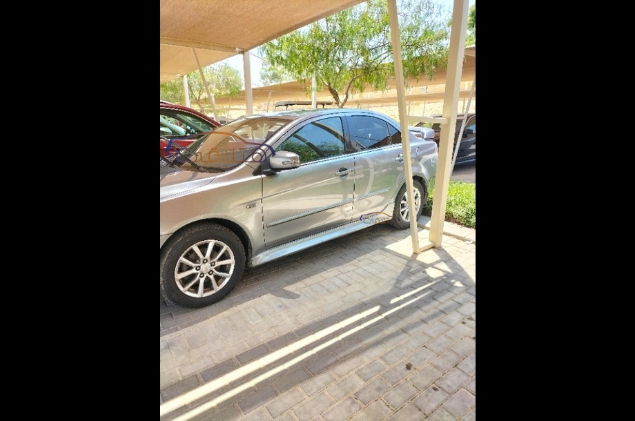 Lancer Puma Mitsubishi 2016 Cairo Silver 7014819 - Car for sale : Hatla2ee
