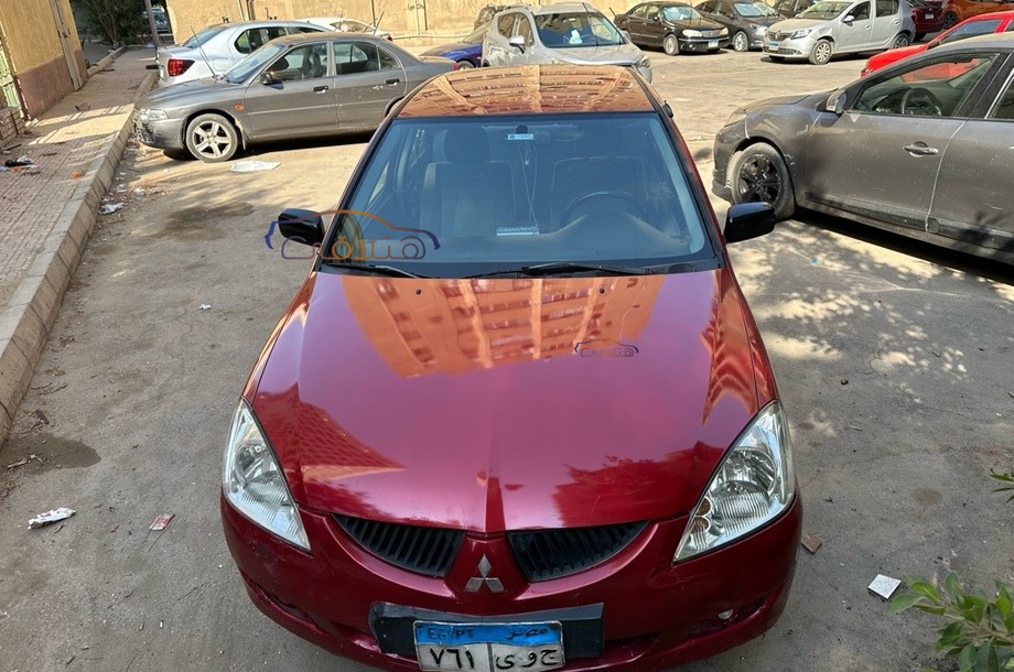 Lancer Mitsubishi 2004 Nasr city Red 7016743 - Car for sale : Hatla2ee