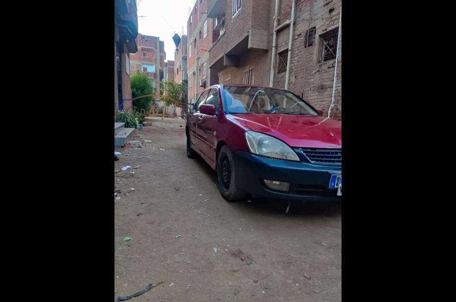 Lancer Puma Mitsubishi 2009 Ashmoun Red 7024891 - Car for sale : Hatla2ee