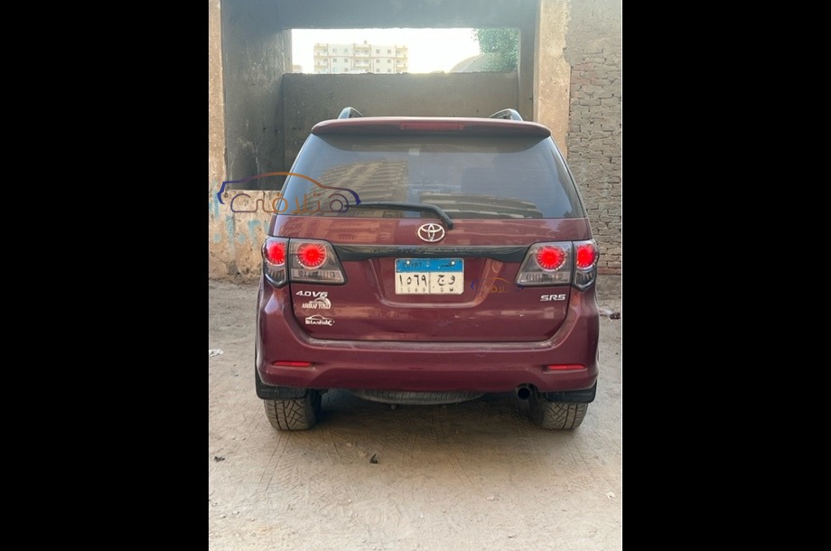 Fortuner Toyota 2013 Giza Dark red 7025878 - Car for sale : Hatla2ee