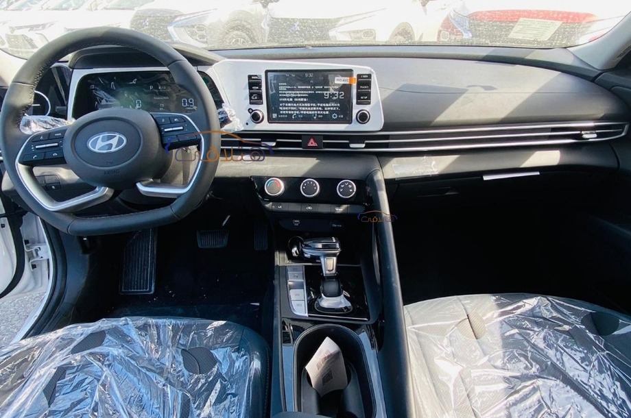 Elantra CN7 Hyundai 2025 Cairo White 7030277 - Car for sale : Hatla2ee