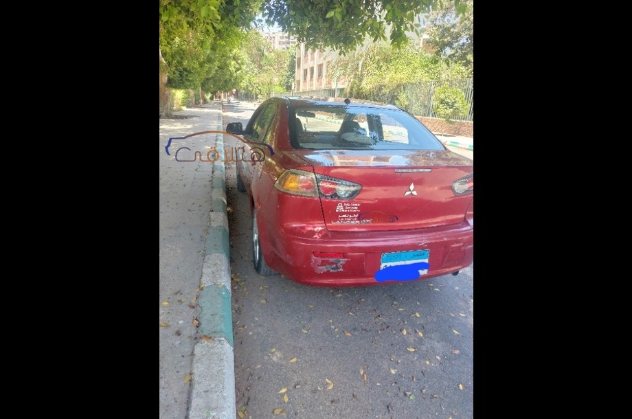 Lancer EX Shark Mitsubishi 2014 Asyut Red 7030879 - Car for sale : Hatla2ee