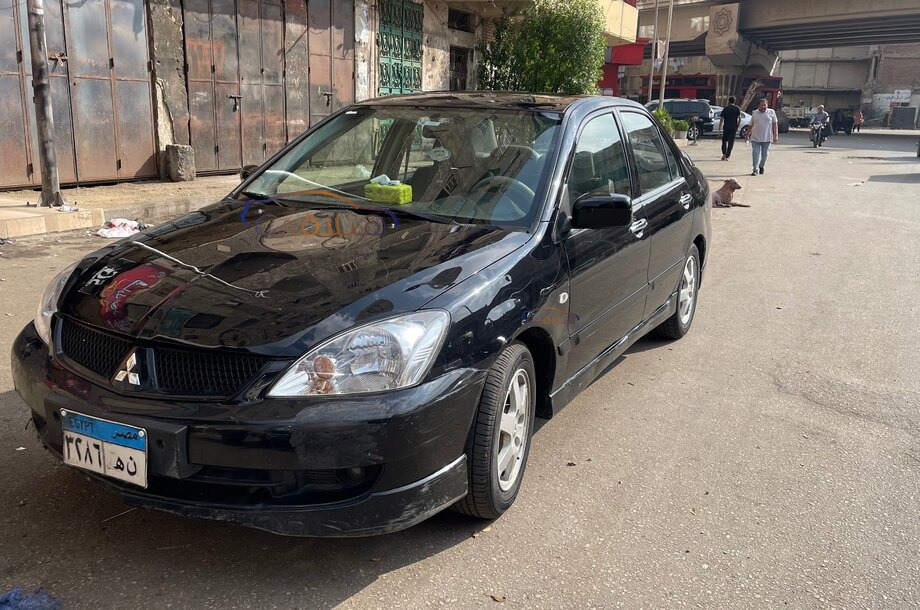 Lancer Puma Mitsubishi 2008 Giza Black 7031189 - Car for sale : Hatla2ee
