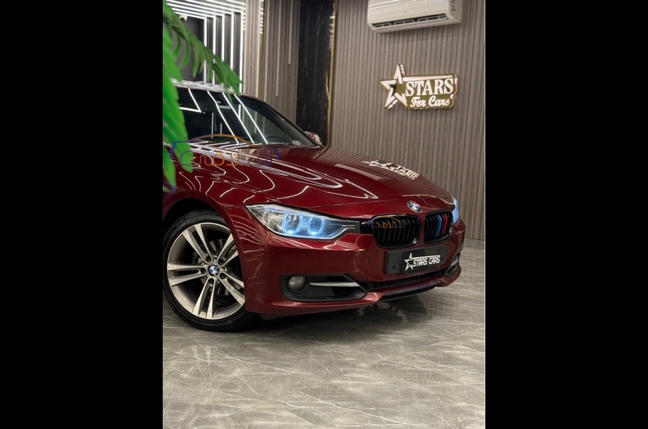 320 BMW 2014 Suez Dark red 7031359 - Car for sale : Hatla2ee