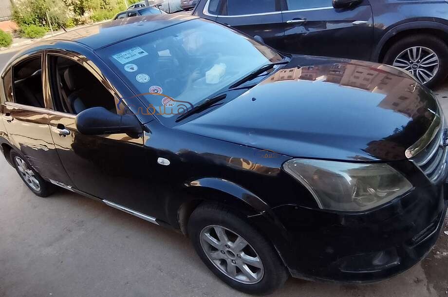 Envy Chery 2013 6 October Black 7032449 - Car for sale : Hatla2ee