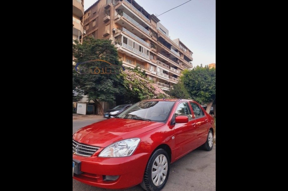 Lancer Puma Mitsubishi 2013 Cairo Red 7032493 - Car for sale : Hatla2ee