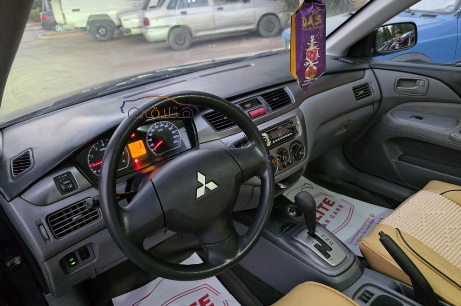 Lancer Puma Mitsubishi 2012 Cairo Blue 7032768 - Car for sale : Hatla2ee