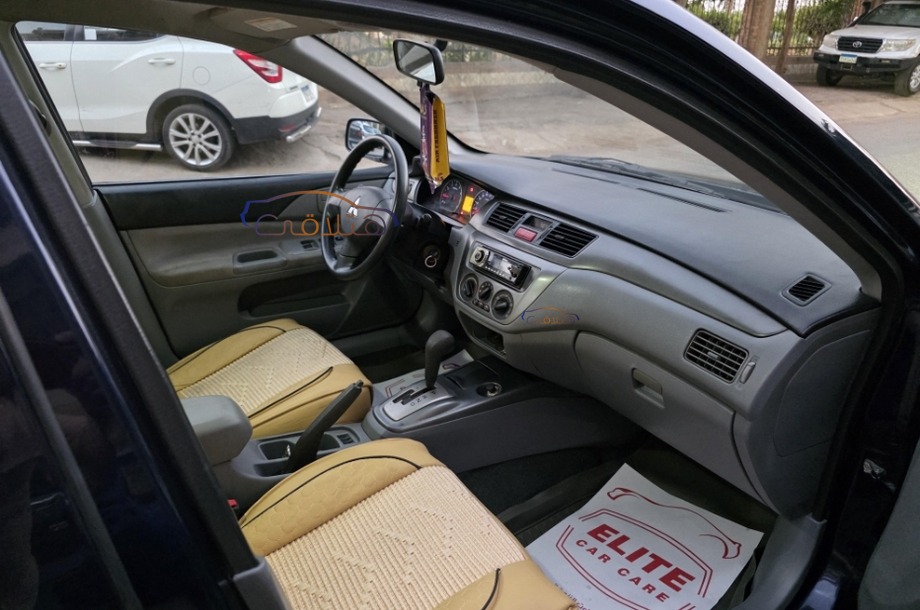 Lancer Puma Mitsubishi 2012 Cairo Blue 7032768 - Car for sale : Hatla2ee