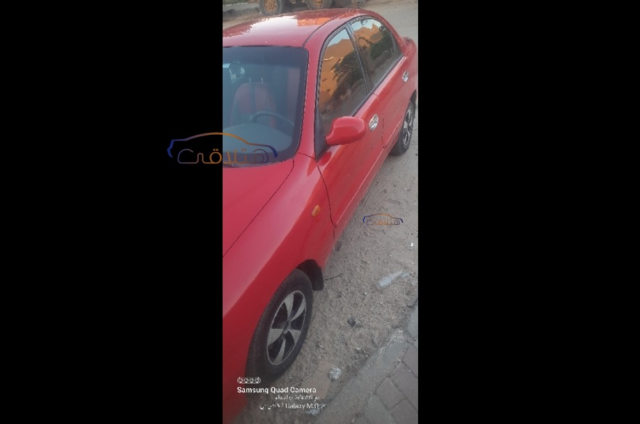 Lanos Daewoo 2001 6 October Red 7034383 - Car for sale : Hatla2ee