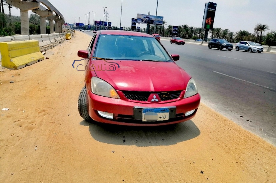 Lancer Puma Mitsubishi 2008 Nasr city Red 7037774 - Car for sale : Hatla2ee