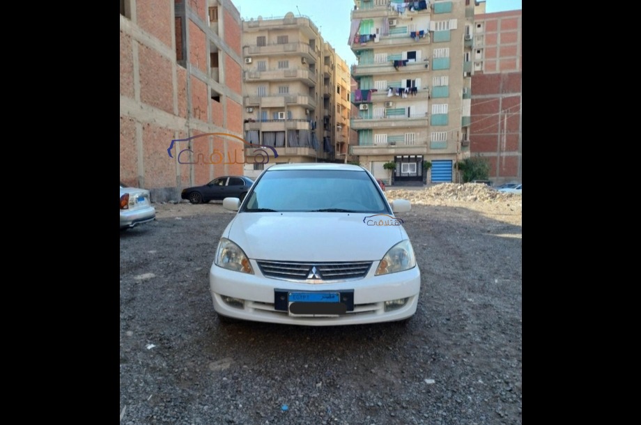 Lancer Puma Mitsubishi 2014 Tanta White 7056226 - Car for sale : Hatla2ee