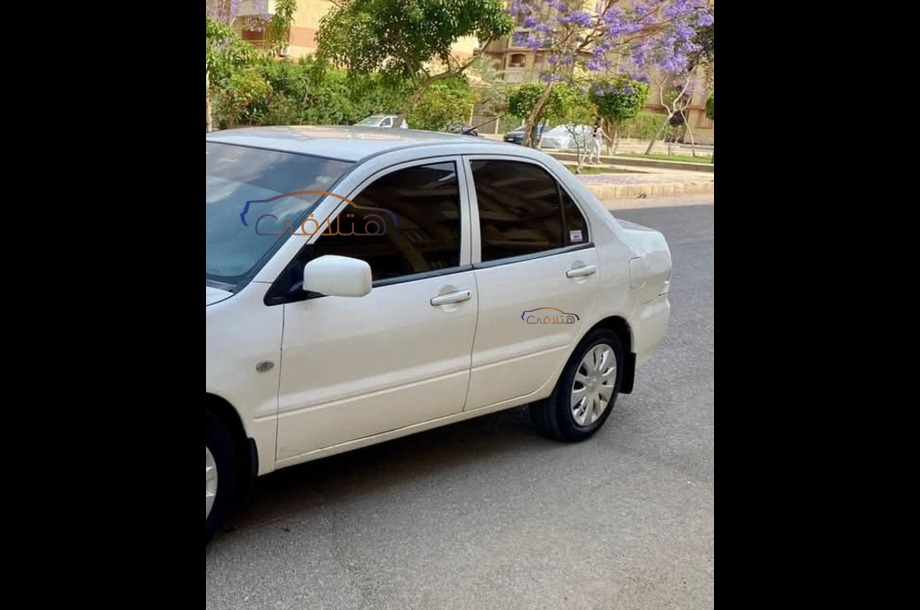 Lancer Puma Mitsubishi 2014 Tanta White 7056226 - Car for sale : Hatla2ee