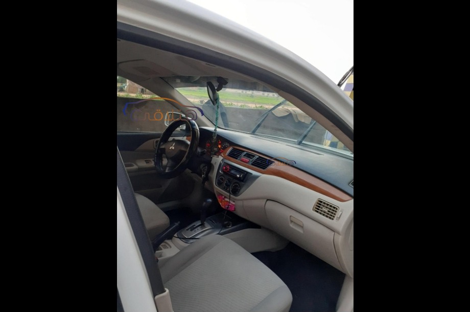 Lancer Puma Mitsubishi 2014 Tanta White 7056226 - Car for sale : Hatla2ee