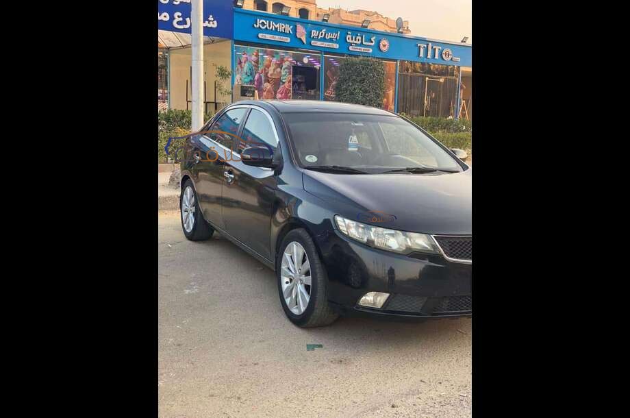 Cerato Kia 2010 Zagazig Black 7060040 - Car for sale : Hatla2ee