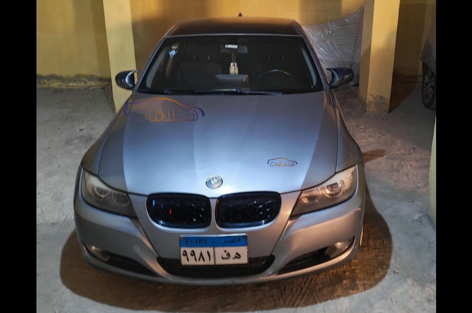 318 BMW 2010 Pyramids Gardens Silver 7061748 - Car for sale : Hatla2ee