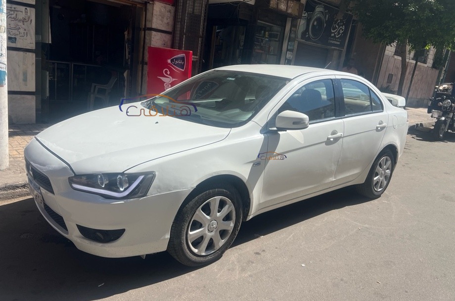 Lancer Mitsubishi 2015 Alexandria White 7062505 - Car for sale : Hatla2ee