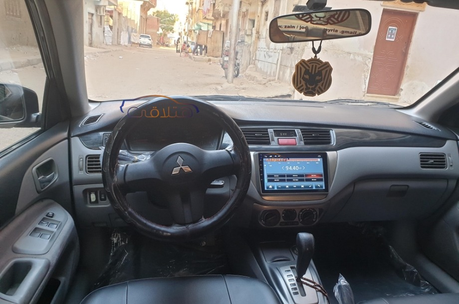 Lancer Puma Mitsubishi 2008 Suez Black 7062741 - Car for sale : Hatla2ee