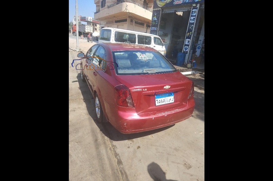 Optra Chevrolet 2005 Bilbeis Dark red 7062773 - Car for sale : Hatla2ee