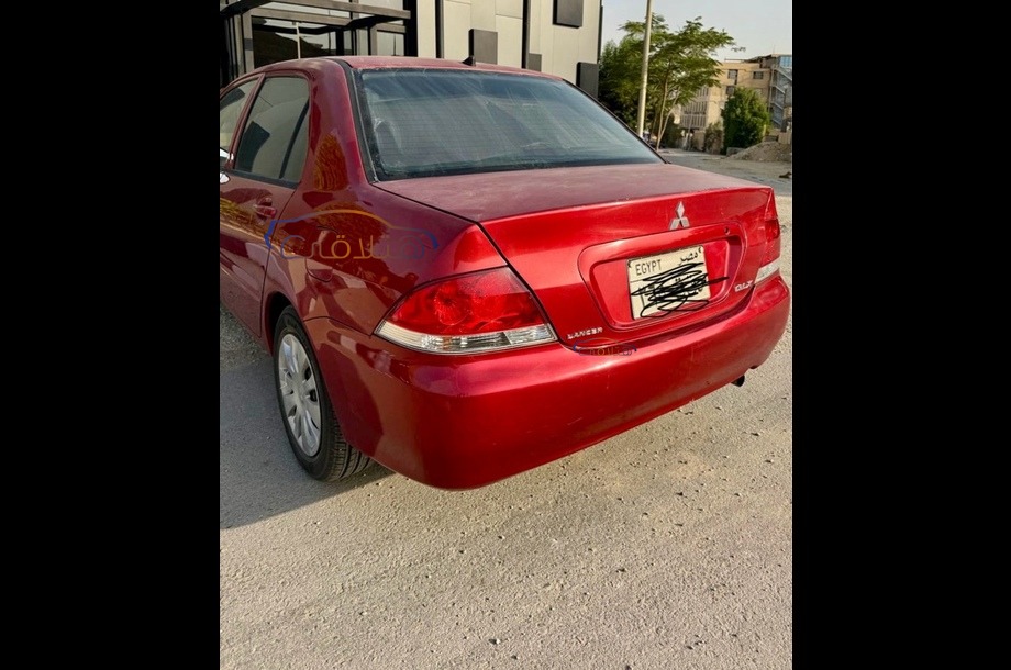Lancer Puma Mitsubishi 2013 Nasr city Red 7063161 - Car for sale : Hatla2ee