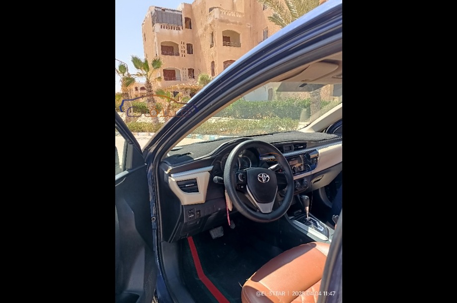 Corolla Toyota 2015 Pyramids Gardens Blue 7063669 - Car for sale : Hatla2ee