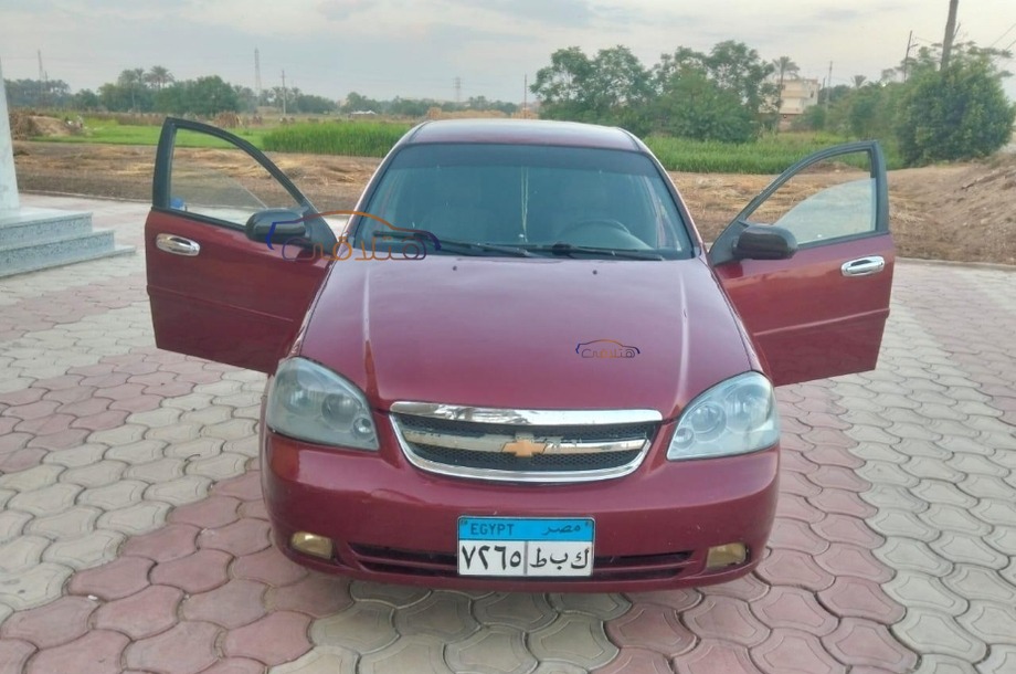 Optra Chevrolet 2009 Heliopolis Dark red 7068099 - Car for sale : Hatla2ee