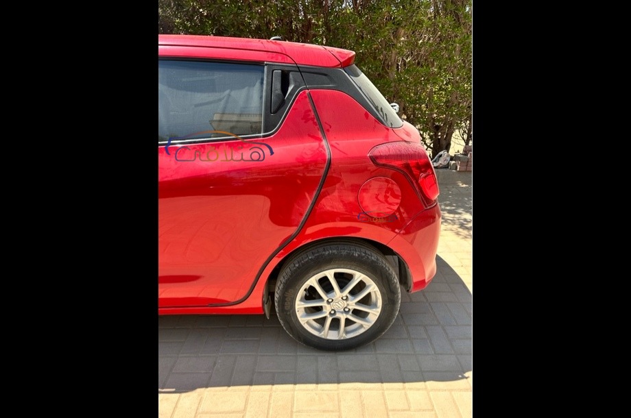 Swift Suzuki 2021 6 October Red 7072401 - Car for sale : Hatla2ee