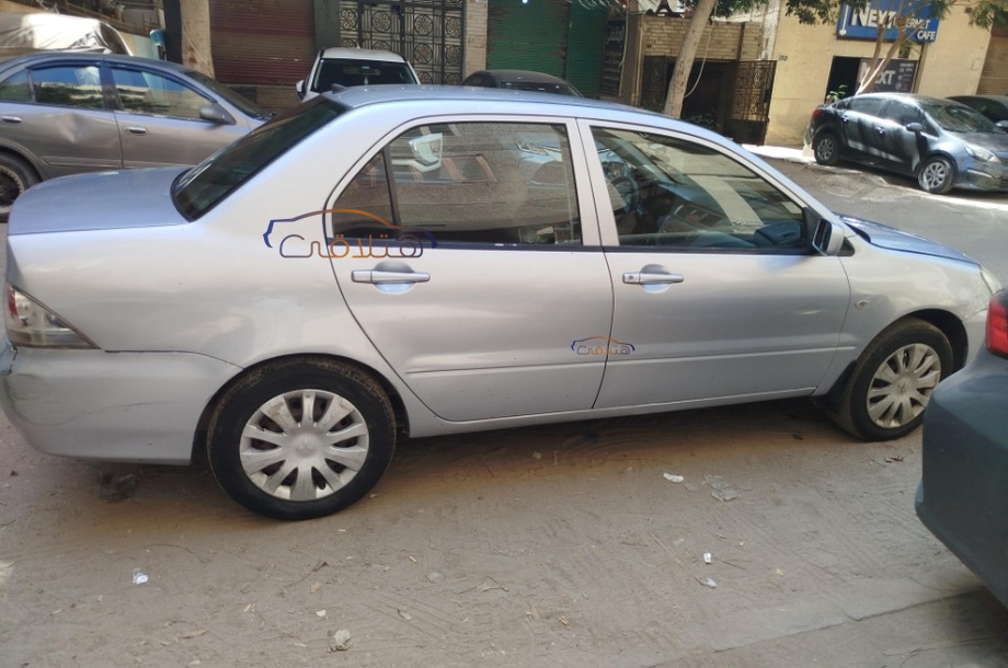 Lancer Puma Mitsubishi 2010 Hadayek October Silver 7076920 - Car for ...