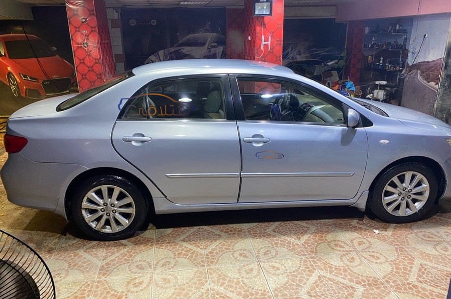Corolla Toyota 2009 Alexandria Cyan 7077536 - Car for sale : Hatla2ee