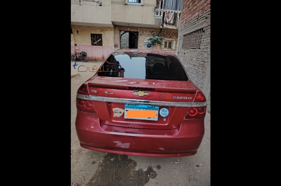 Aveo Chevrolet 2014 Dokki Dark red 7088562 - Car for sale : Hatla2ee