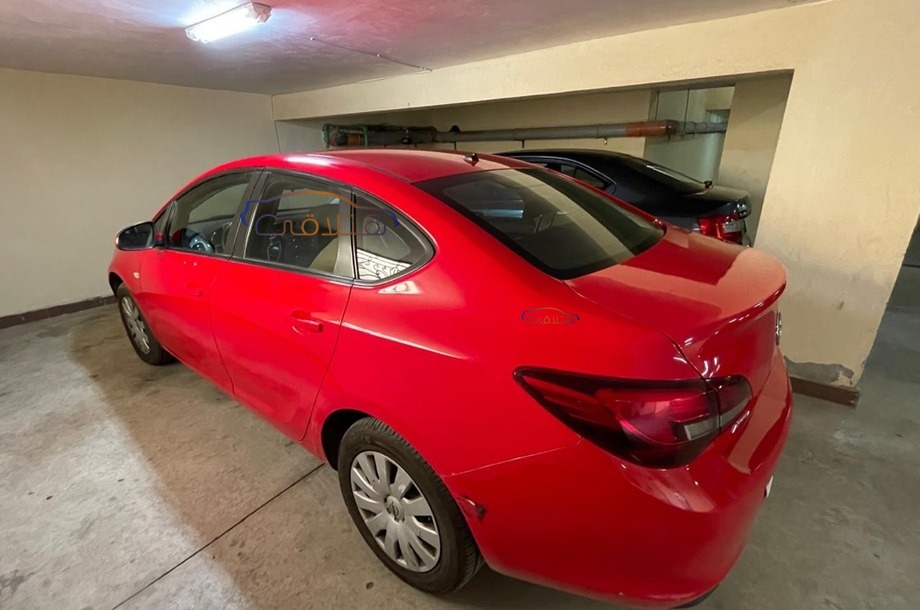 Astra Opel 2013 Tagamo3 - New Cairo Red 7091435 - Car for sale : Hatla2ee