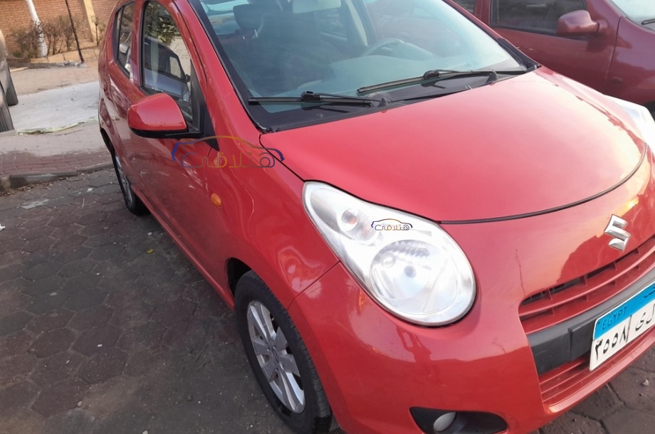 Celerio Suzuki 2011 6 October Red 7093435 - Car for sale : Hatla2ee