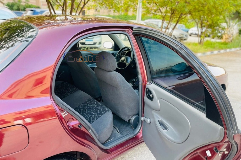 Lanos Chevrolet 2013 Helwan Dark red 7095557 - Car for sale : Hatla2ee