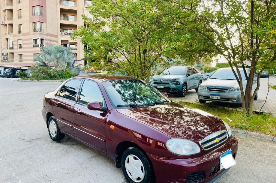 Lanos Chevrolet 2013 Helwan Dark red 7095557 - Car for sale : Hatla2ee