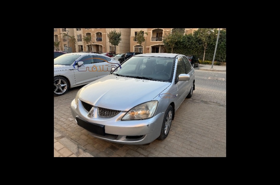 Lancer Puma Mitsubishi 2006 Cairo Silver 7098595 - Car for sale : Hatla2ee